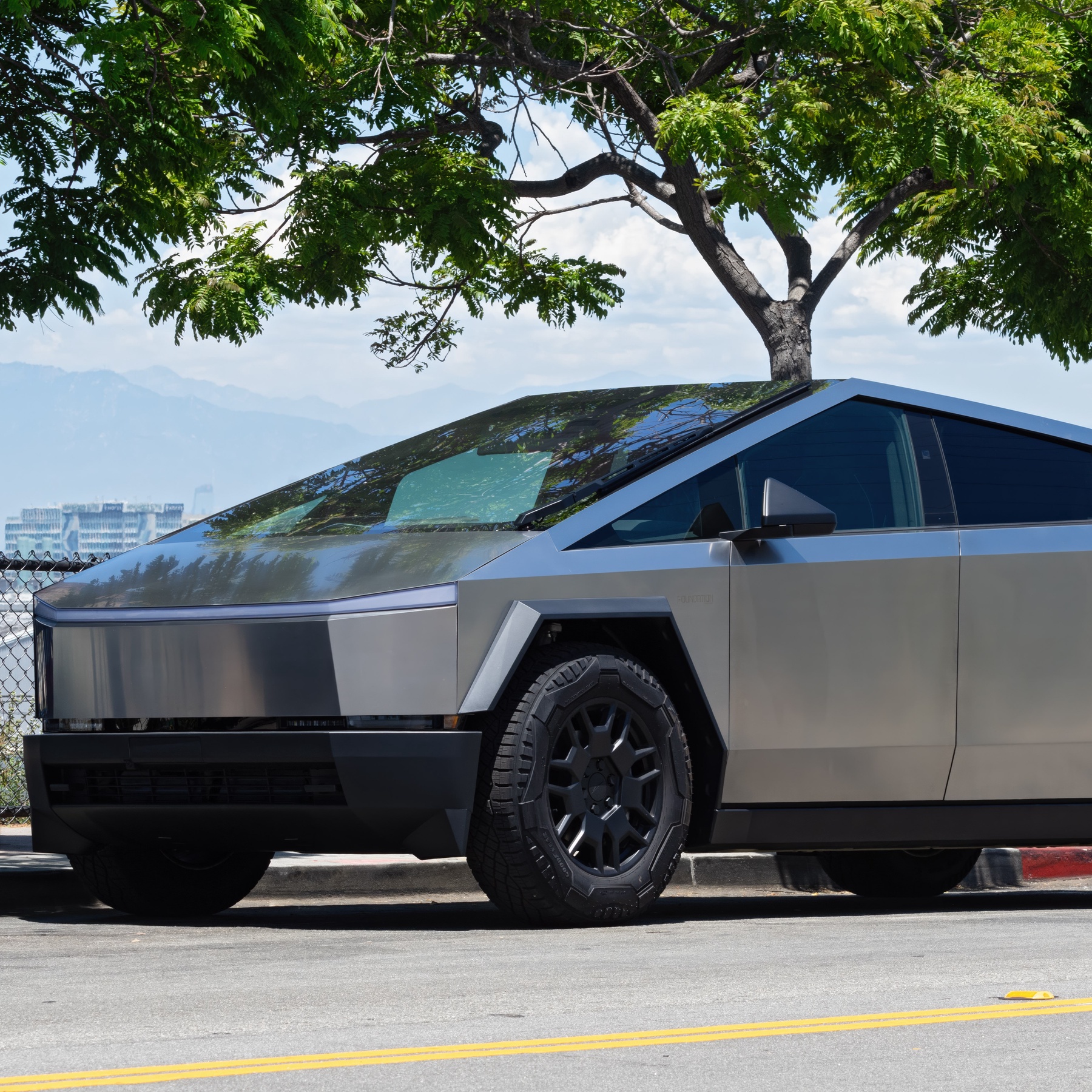 Particle News: Tesla's Cybertruck Finally Gets Full Self-Driving Software