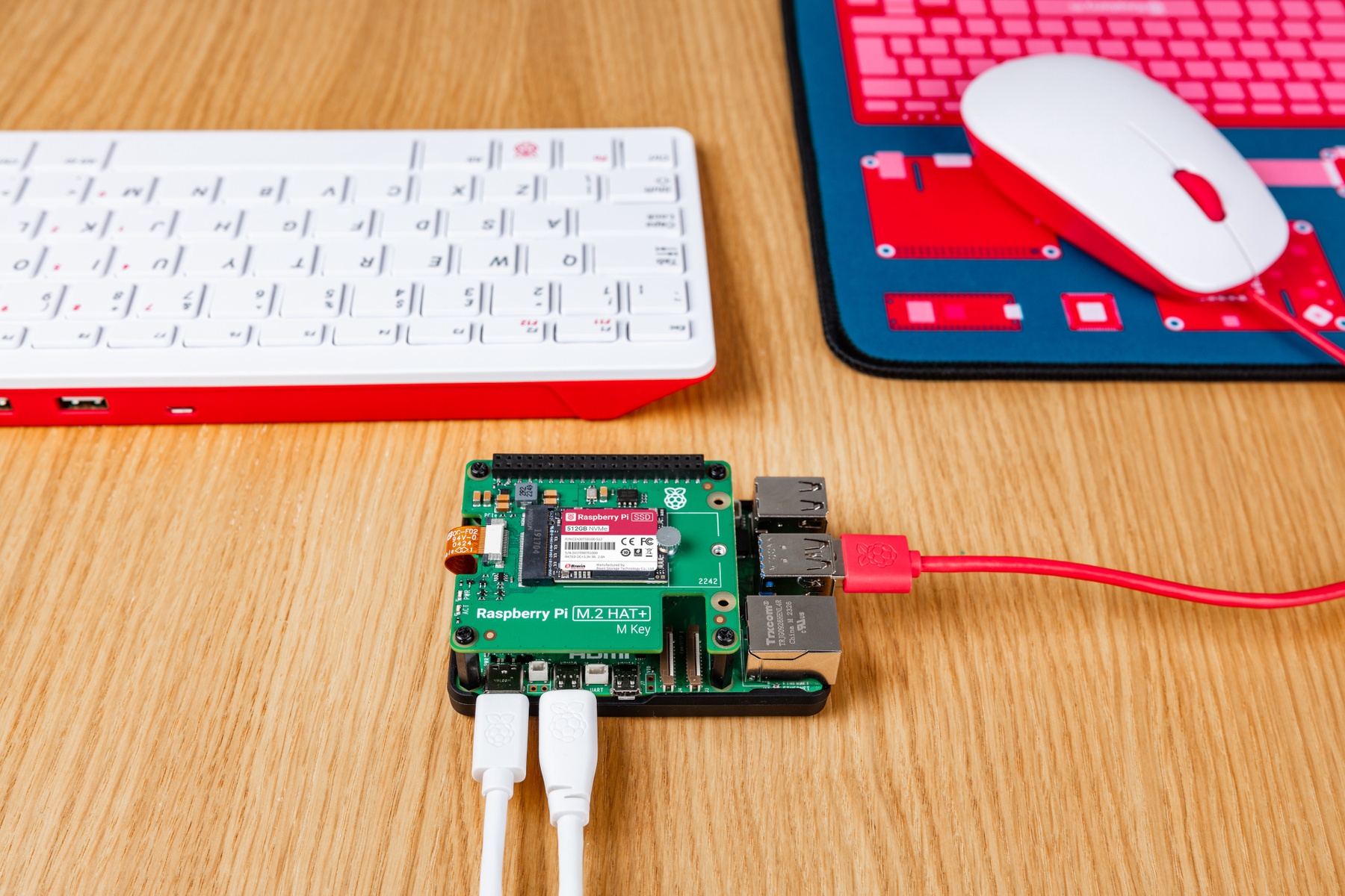 Particle News: Raspberry Pi Expands Product Line with AI Add-ons and Branded SSDs