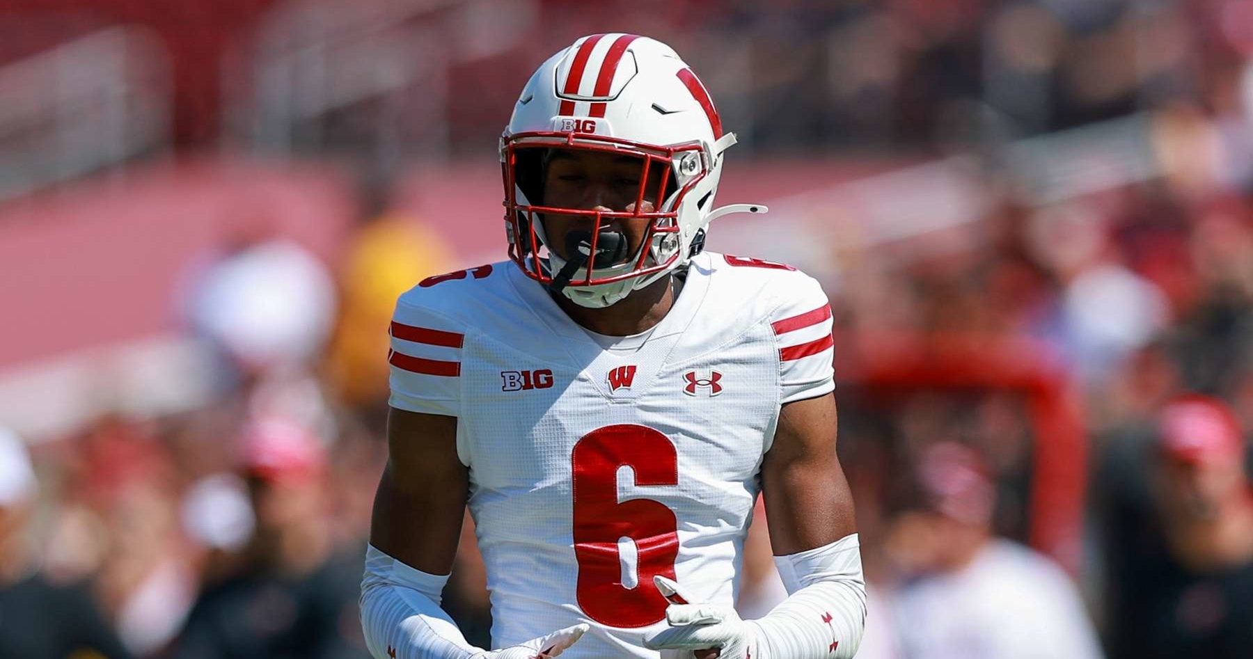 Particle News: Xavier Lucas' Transfer to Miami Challenges NCAA Rules and Wisconsin's NIL Contract