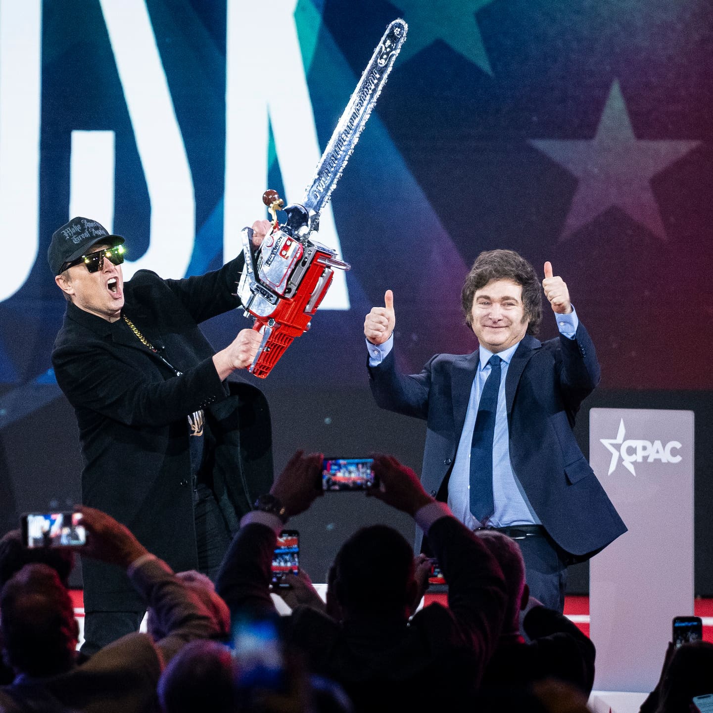 Particle News: Elon Musk Wields Chainsaw to Symbolize U.S. Bureaucracy Cuts