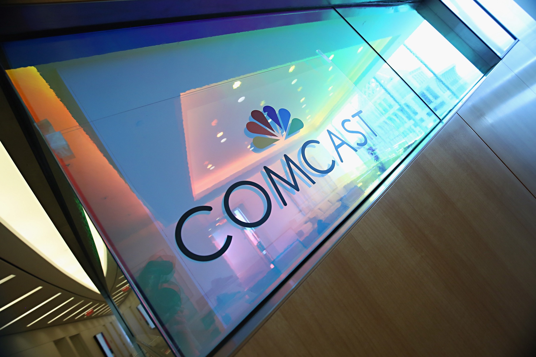 Particle News: Comcast Reveals 2024 Executive Pay Details and SpinCo ...
