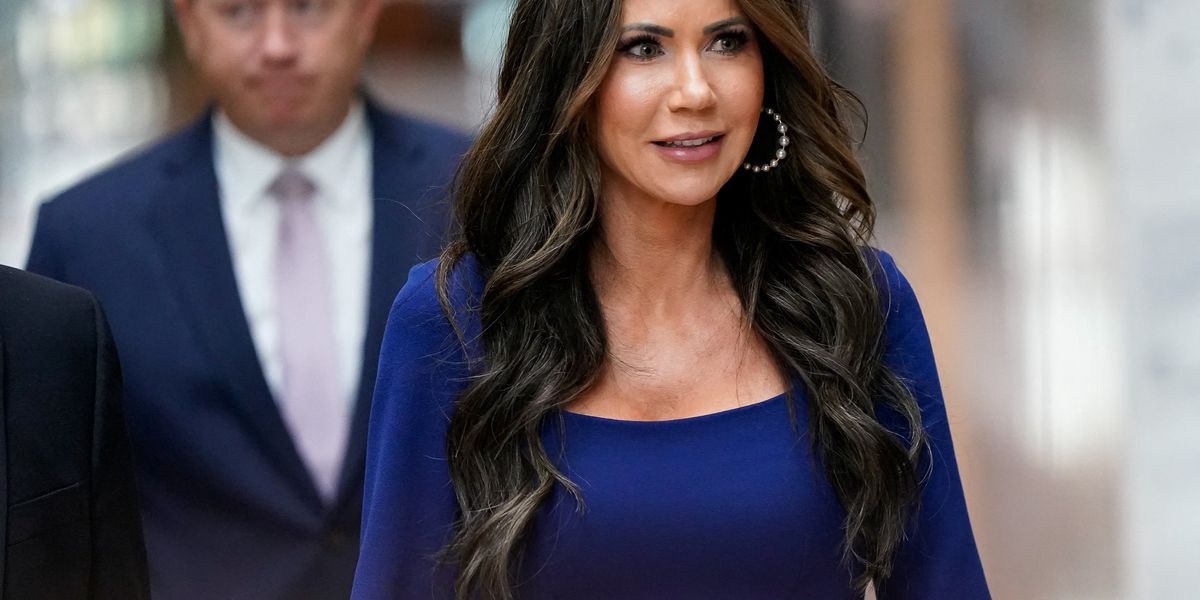 Particle News: DHS Chief Kristi Noem Draws Backlash for 'Suck It' Post on Dismissed Migrant Lawsuit