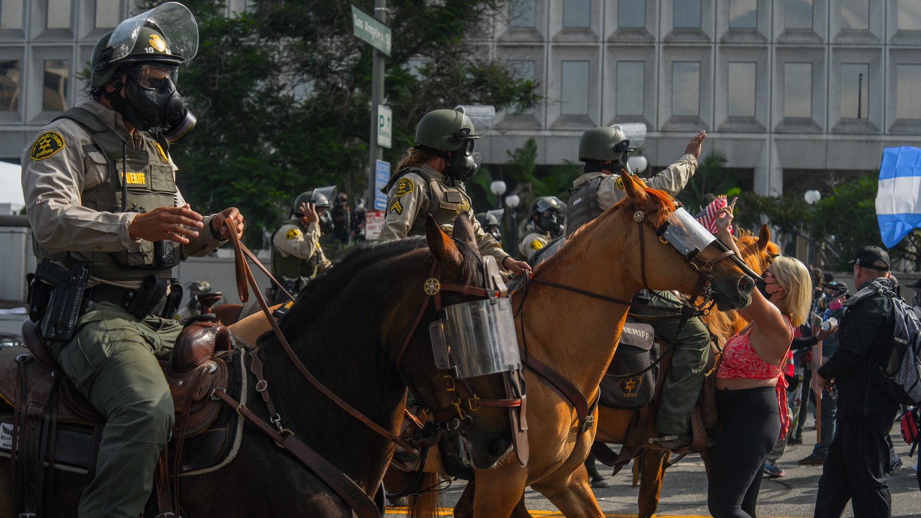 Particle News: Los Angeles Charges Over 40 Protesters in Violent Anti ...