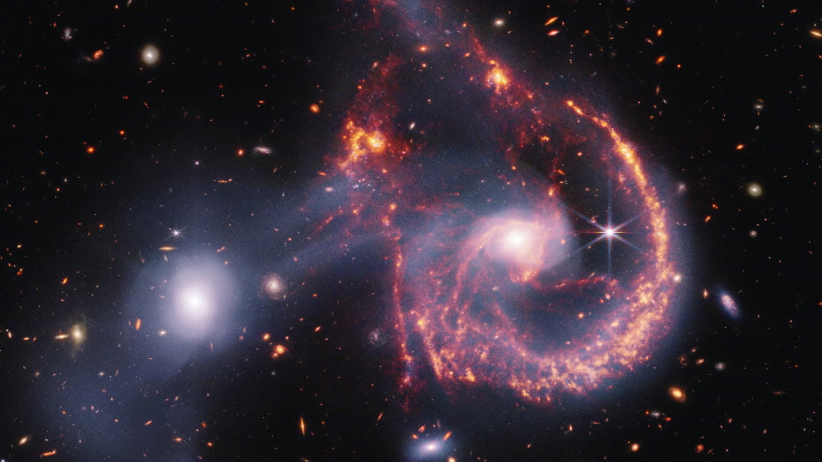 Particle: James Webb Captures Stunning Image of Two Galaxies Colliding