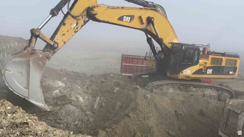 Excavator Breaking Hard Rock