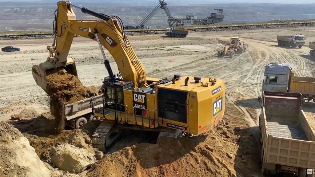 Caterpillar 385C & 6015B Excavators in Massive Mine - Mega Machines Channel
