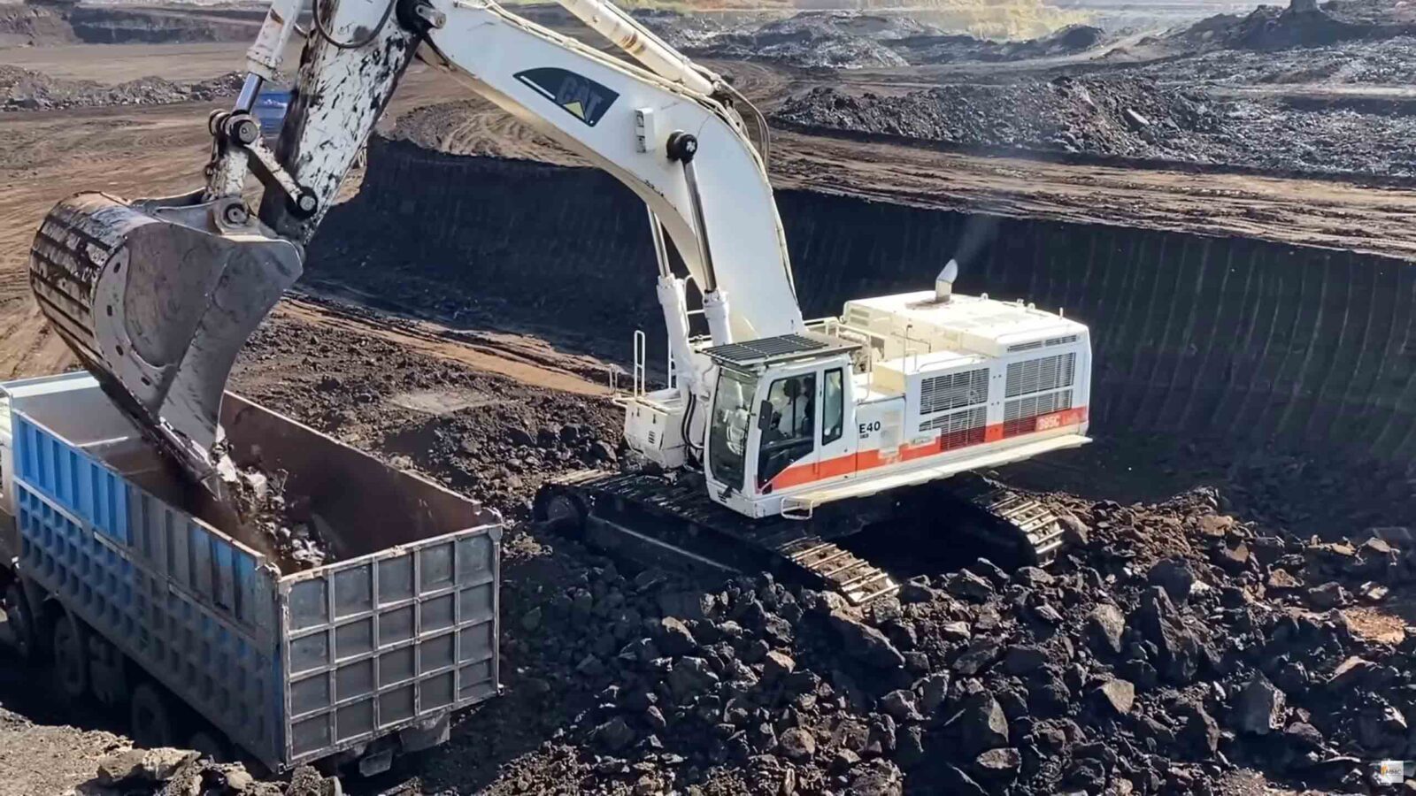 Excavator Breaking Hard Rock