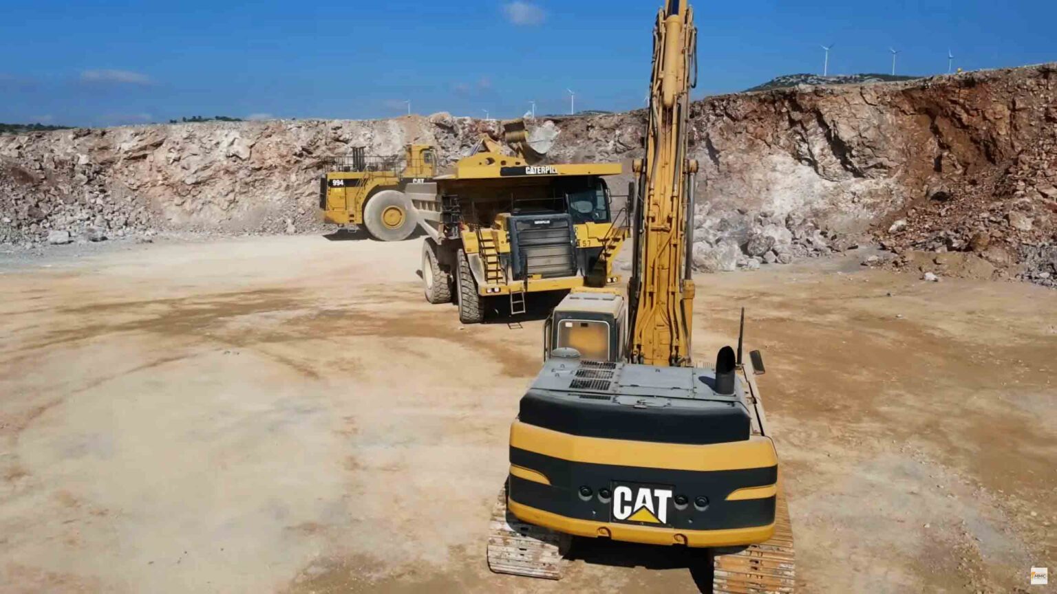 Excavator Breaking Hard Rock