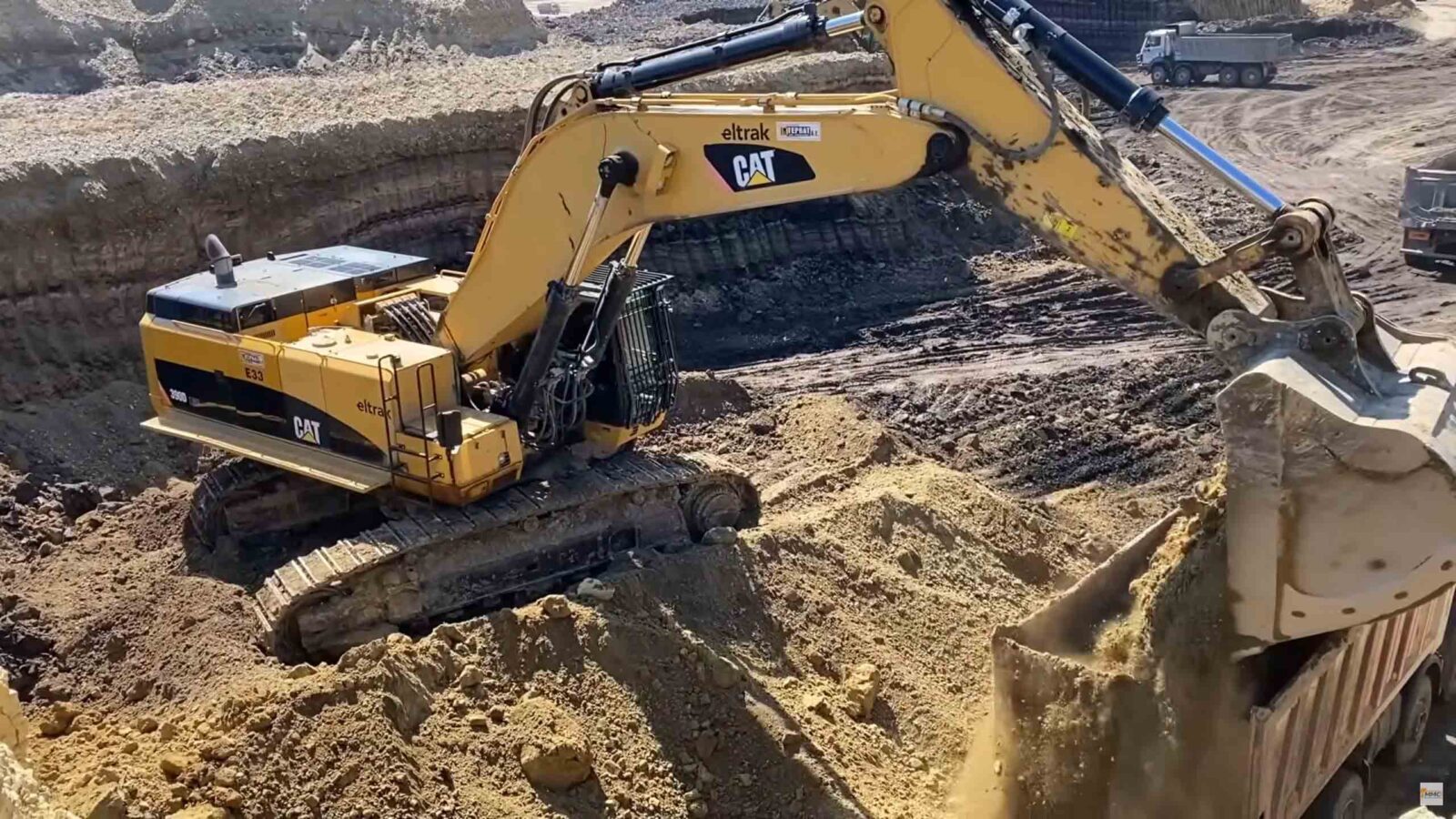Excavator Breaking Hard Rock