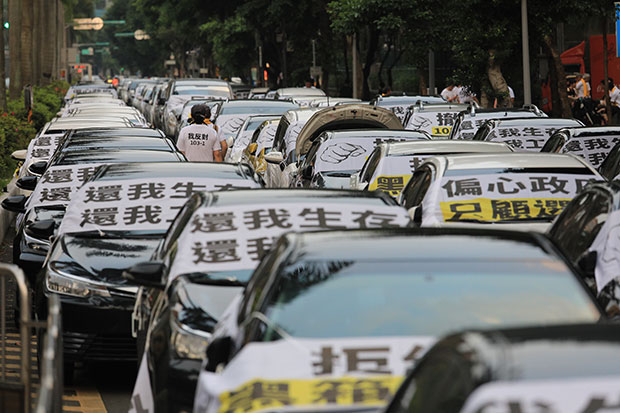 As Uber and Taxi Drivers Take to the Streets, Taiwan’s Democracy is ...